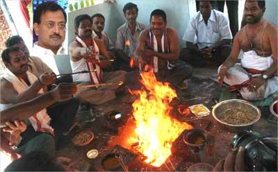 rediff.com: Pooja, havan to help Raju get bail!