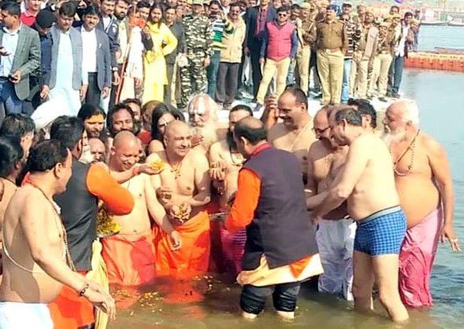 PHOTOS: Yogi's Cabinet meets at Kumbh mela - Rediff.com India News