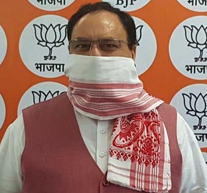 Coronavirus in India: BJP leaders make photos of wearing face masks ...