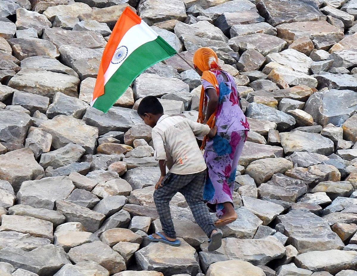 Ration depot holder loses licence for forcing people to buy flag to get ...