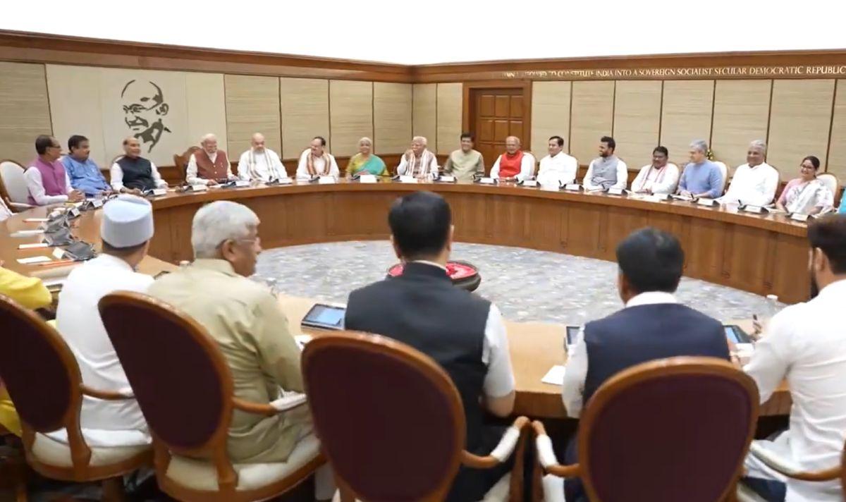 New Modi cabinet meets as portfolios awaited