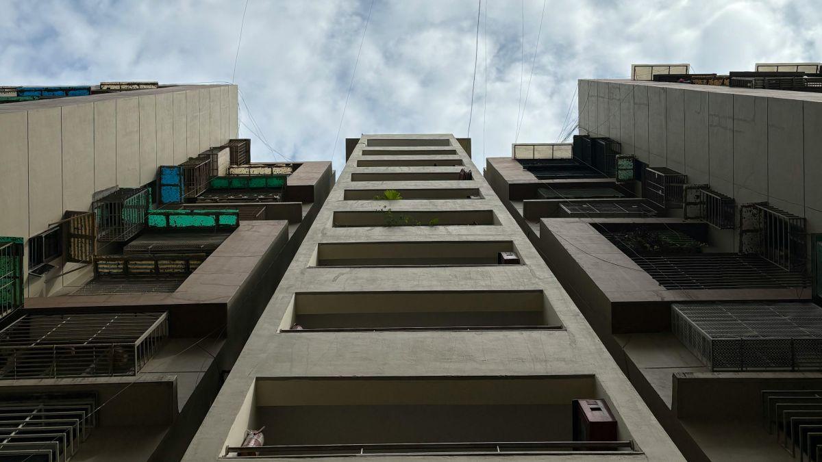 Surat man falls from 10th floor while asleep, gets stuck on 8th ...