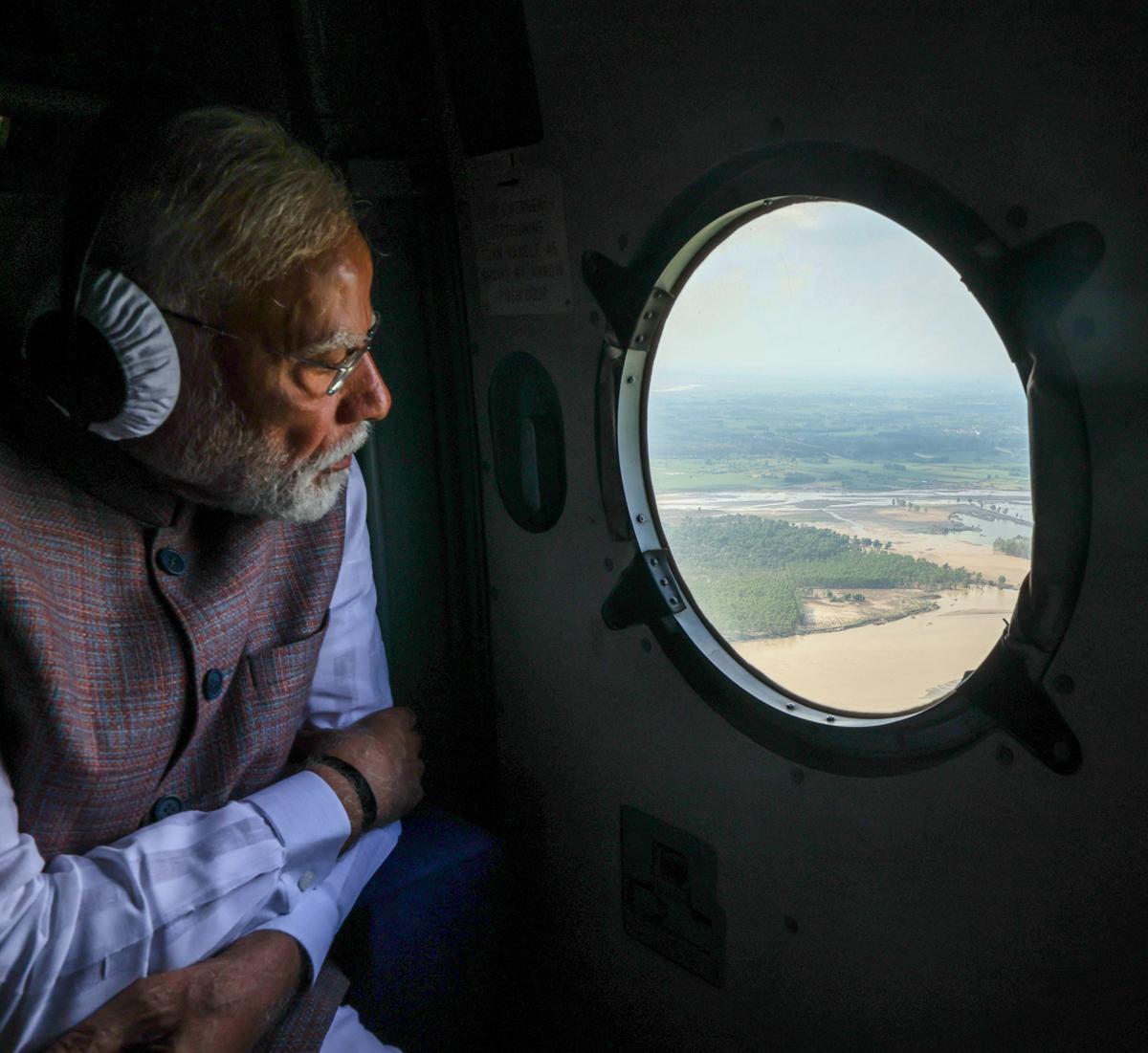 Modi announces Rs 1,600 cr relief package for flood-ravaged Punjab - Rediff.com India News