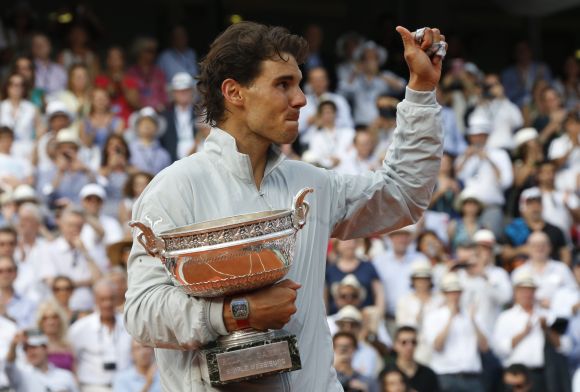 PHOTOS: Nadal wins record extending ninth French Open title - Rediff Sports